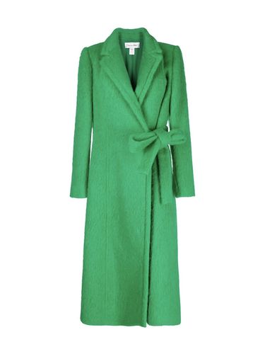 How to wear a green coat and the best green coats to buy - Vogue ...