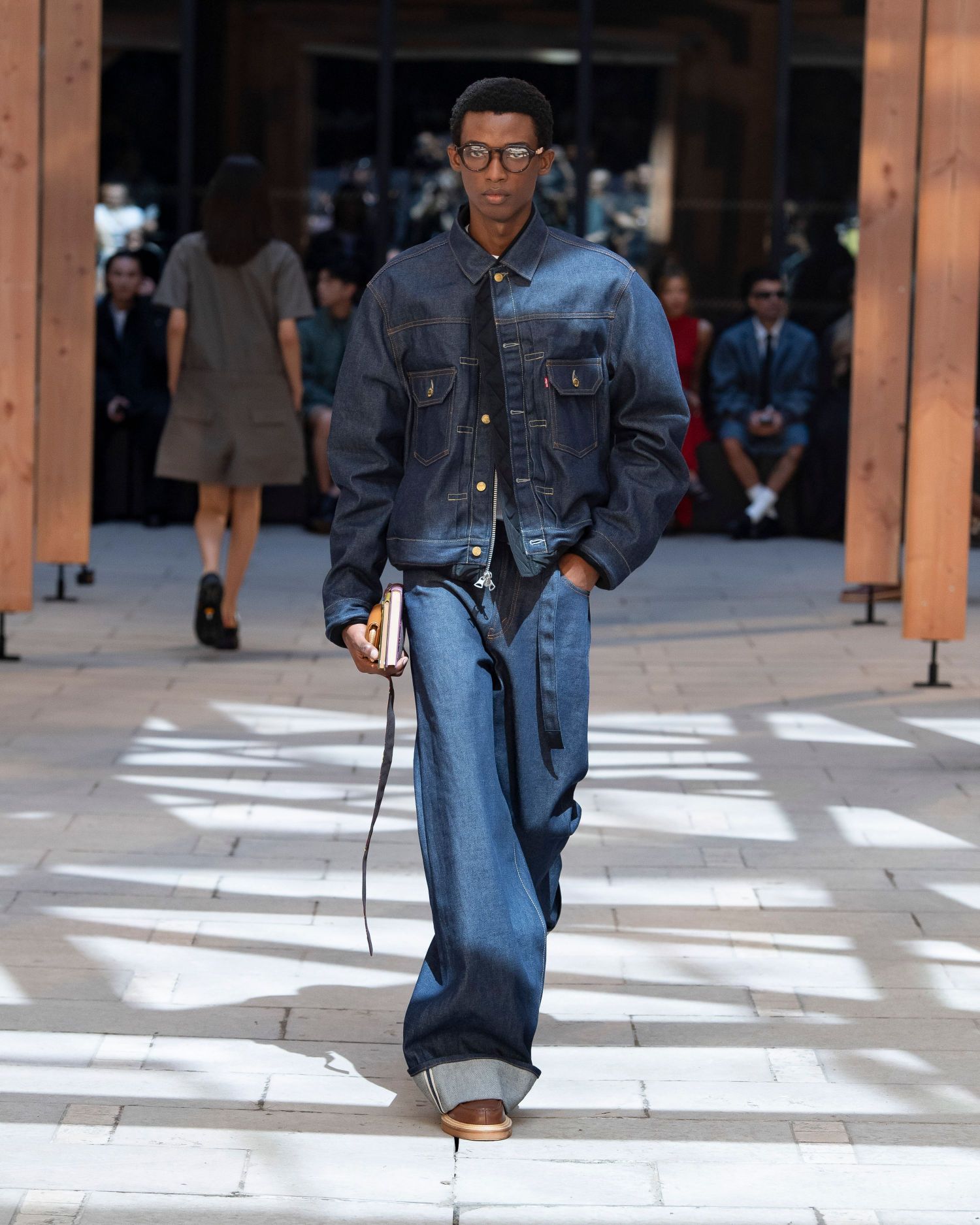 Sacai teases upcoming collaboration with Levi’s at SS25 Paris Fashion ...