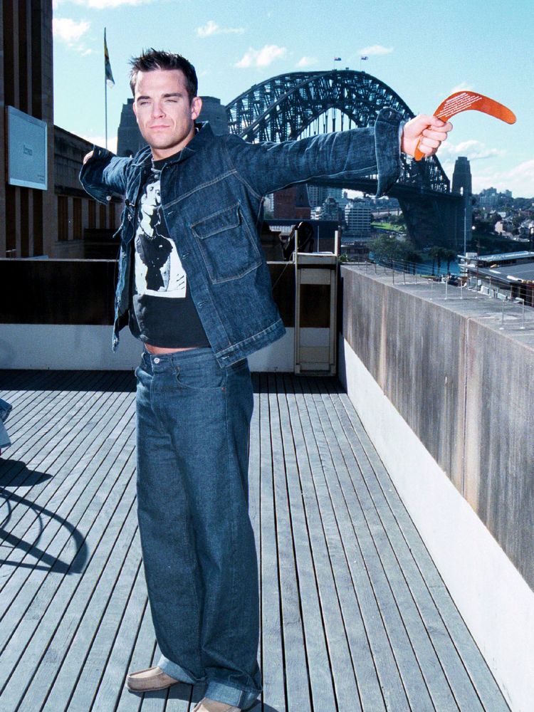 12 throwback Robbie Williams looks that prove he’s a low-key fashion ...