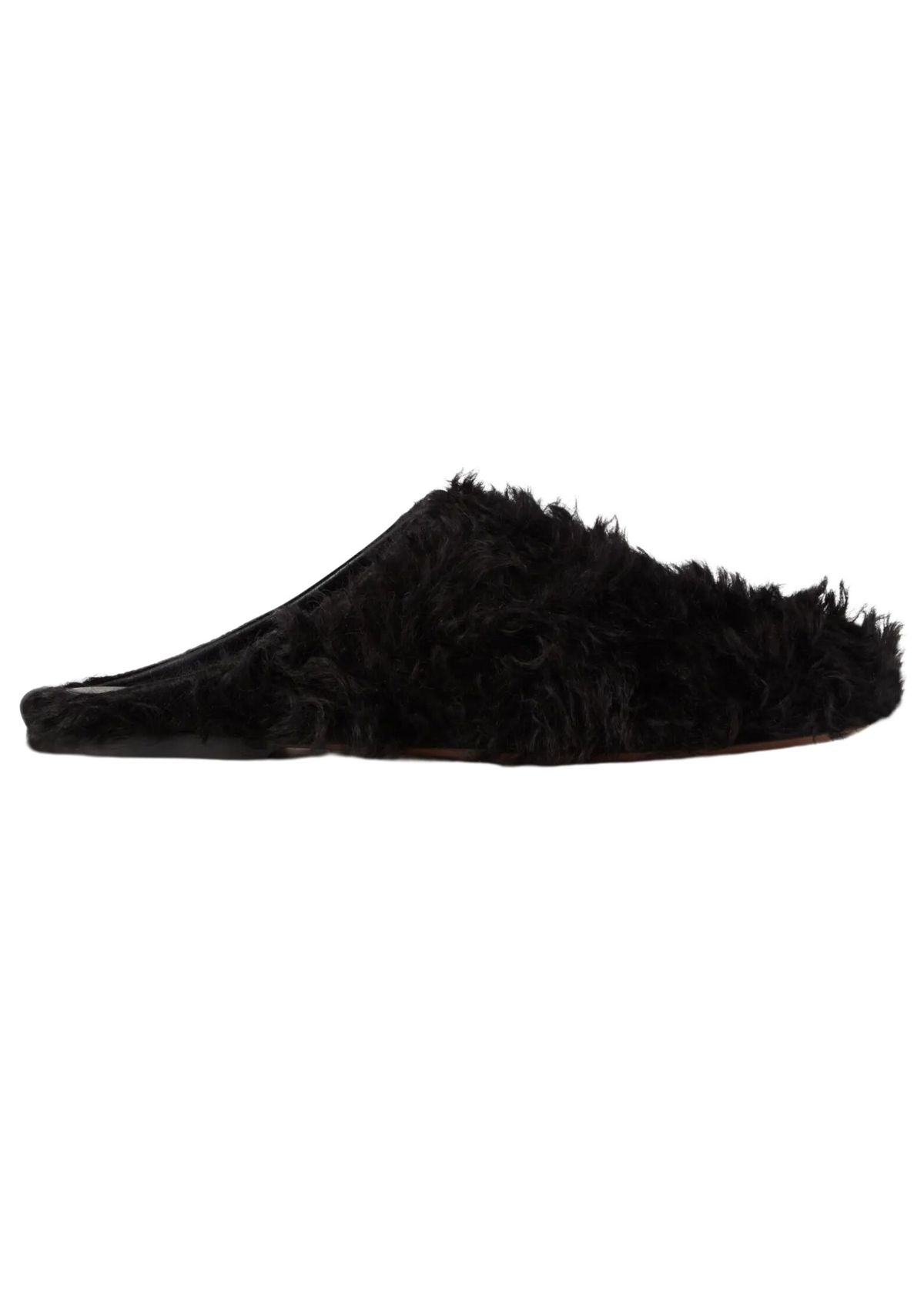 The best 20 fuzzy slippers to keep your feet warm this winter - Vogue ...
