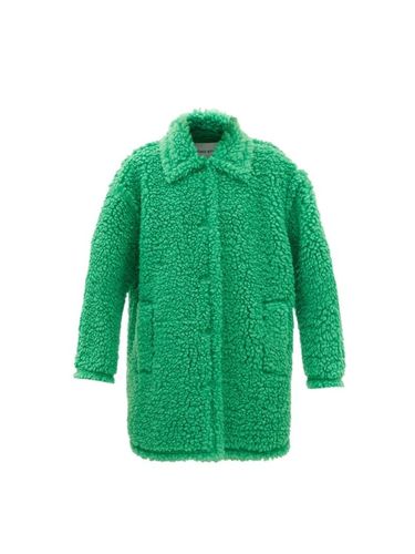 How to wear a green coat and the best green coats to buy - Vogue ...