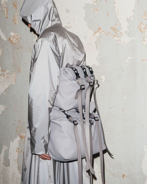 Come backstage to see all the ‘drenched’ details of Rains' SS24 runway ...