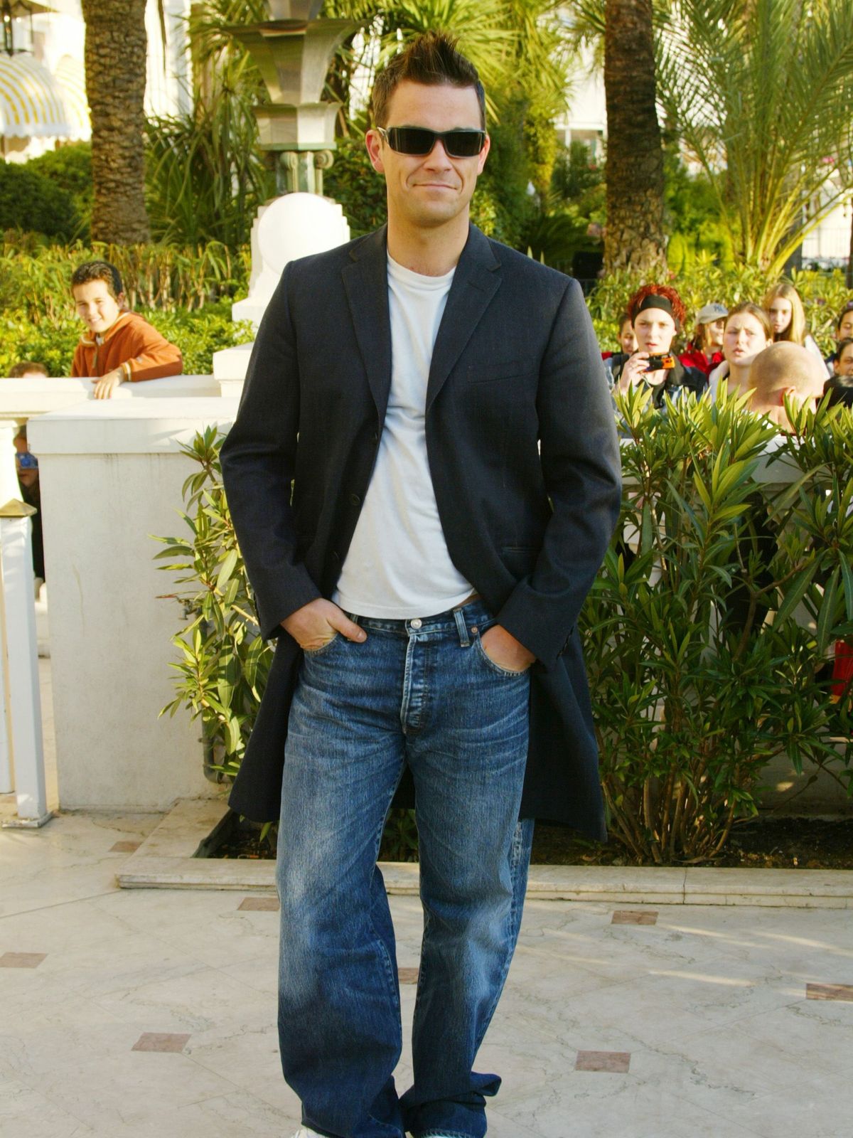 12 throwback Robbie Williams looks that prove he’s a low-key fashion ...