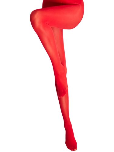 How to wear the red stockings trend this Valentine's Day - Vogue ...
