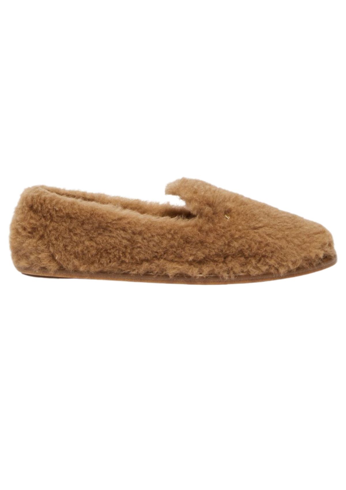 The best 20 fuzzy slippers to keep your feet warm this winter - Vogue ...