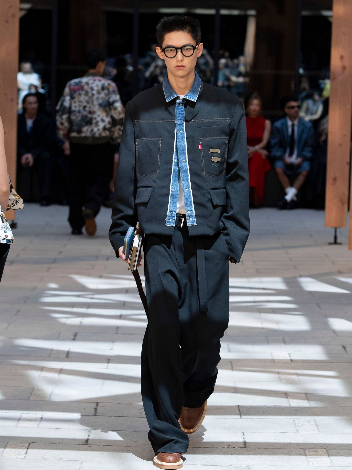 Sacai teases upcoming collaboration with Levi’s at SS25 Paris Fashion ...