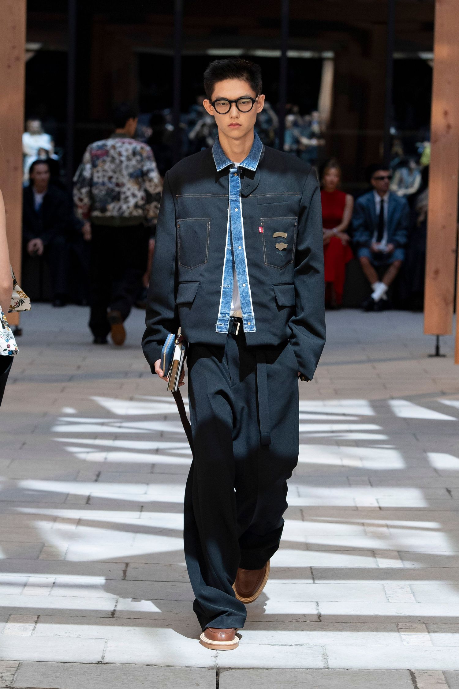 Sacai teases upcoming collaboration with Levi’s at SS25 Paris Fashion ...