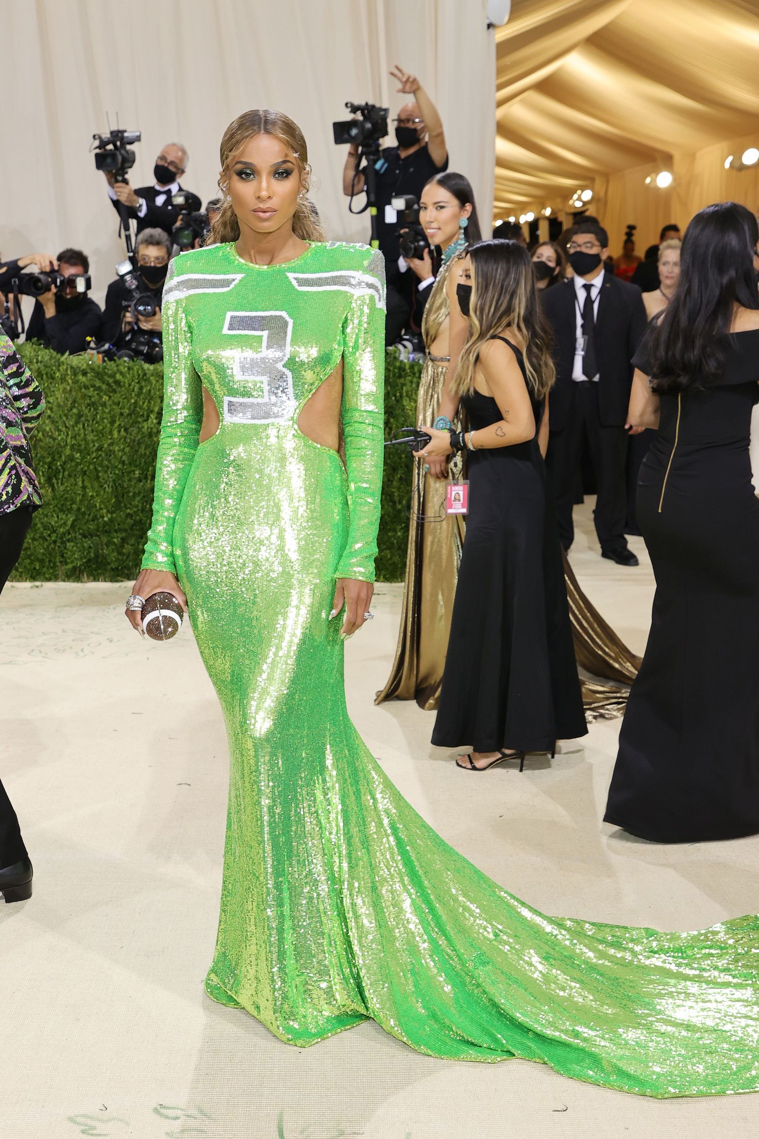 Peter Dundas created Ciara a gown inspired by Russell Wilson's football ...